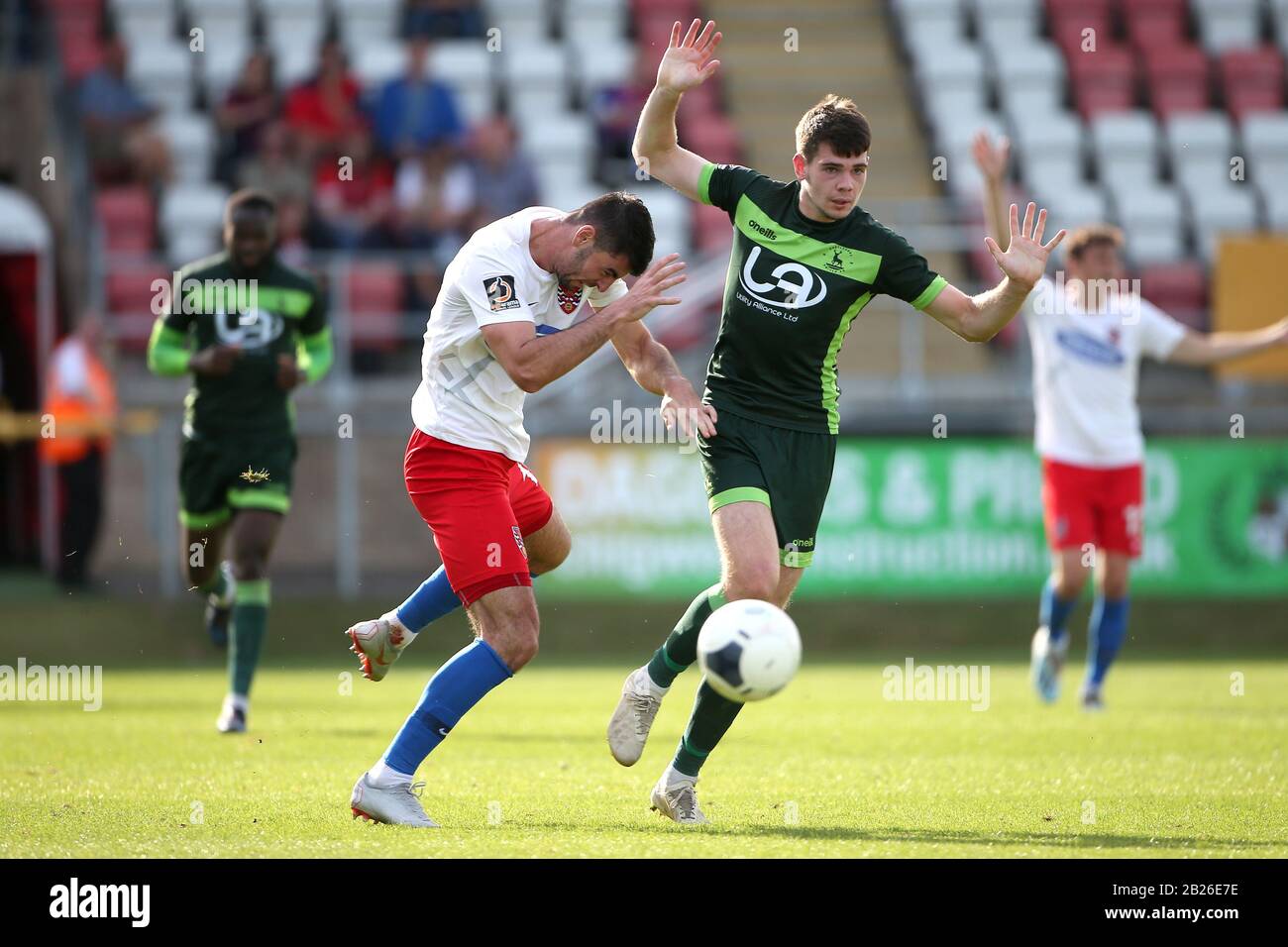 Joe Quigley of Dagenham and Redbridge and Aaron Cunningham of ...