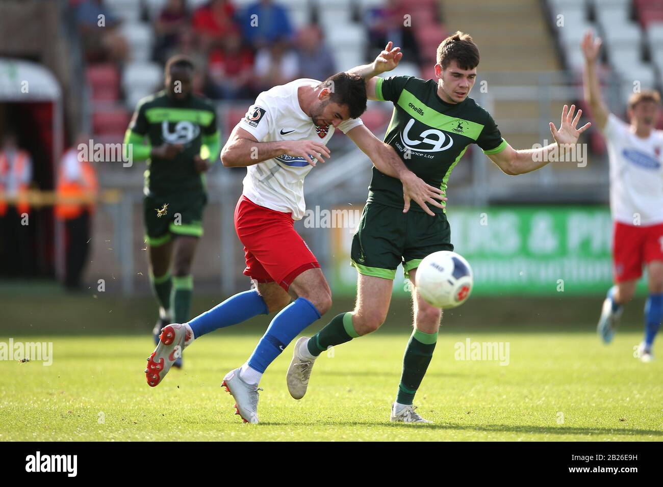 Joe Quigley of Dagenham and Redbridge and Aaron Cunningham of ...