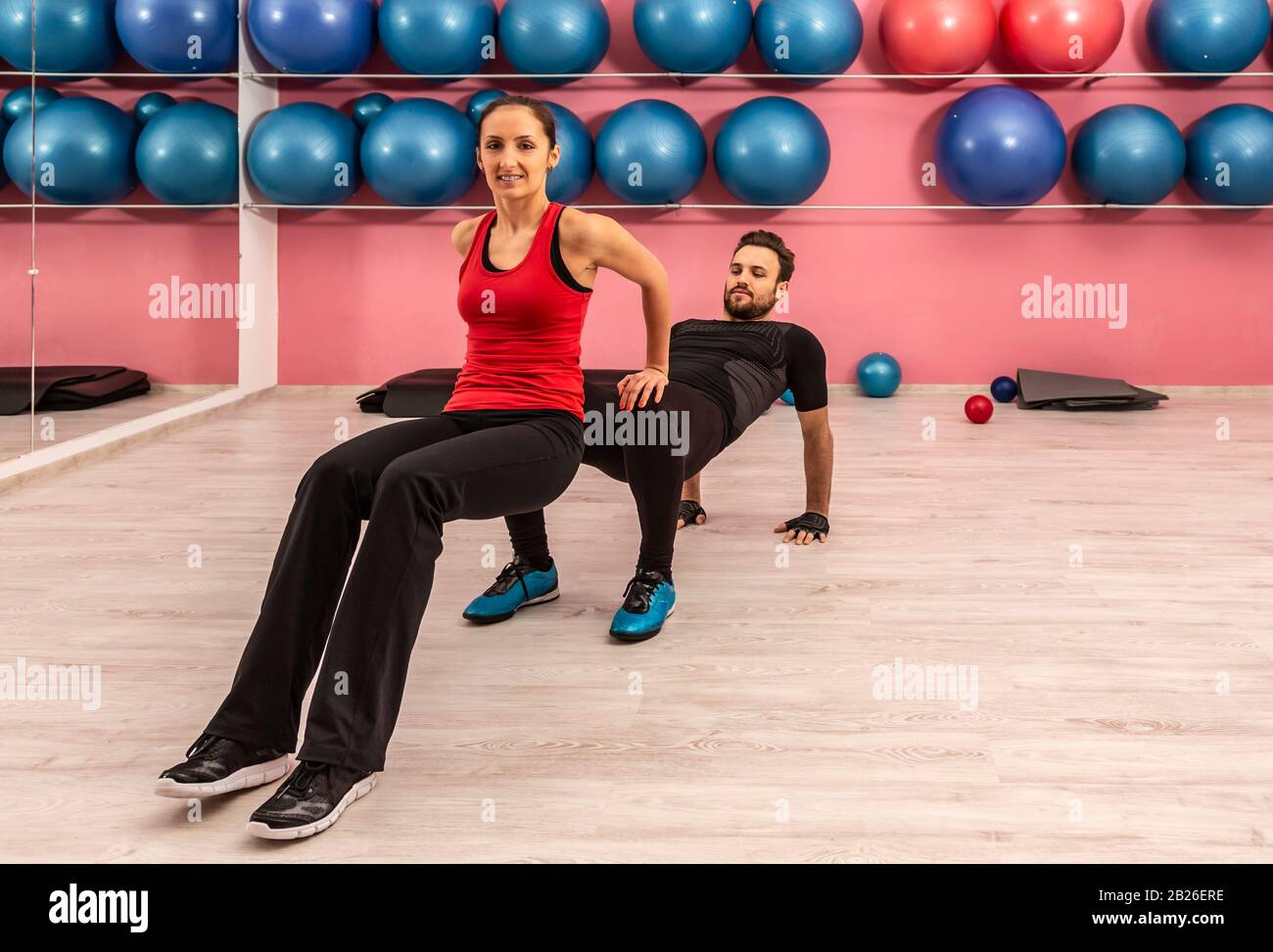Portrait couple doing physical exercise hi-res stock photography and ...
