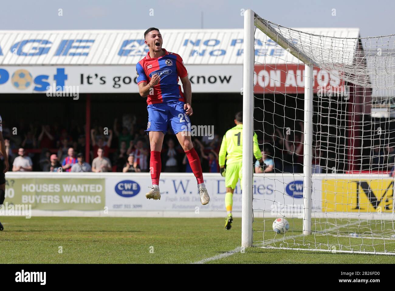 Ollie Harfield of Dagenham and Redbridge scores the first goal for his ...