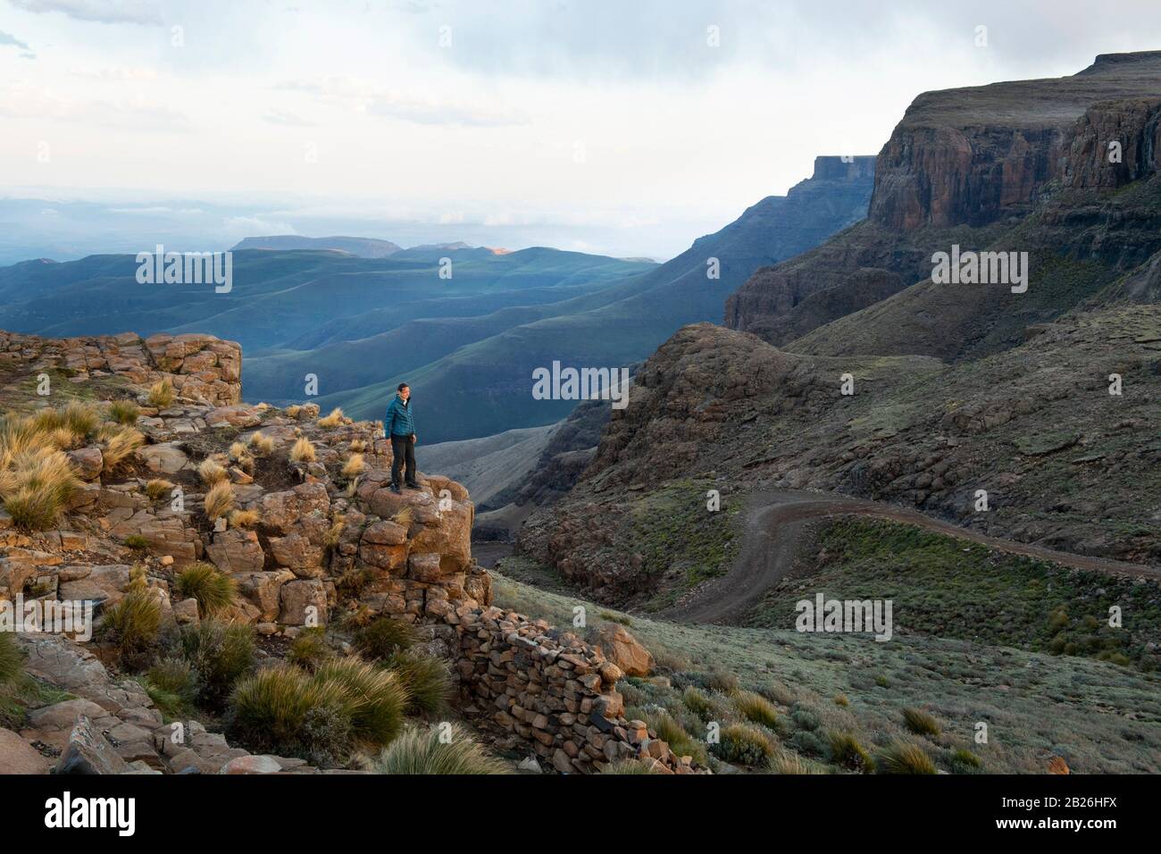 Tourist looking over Sani Pass, Lesotho Stock Photo - Alamy