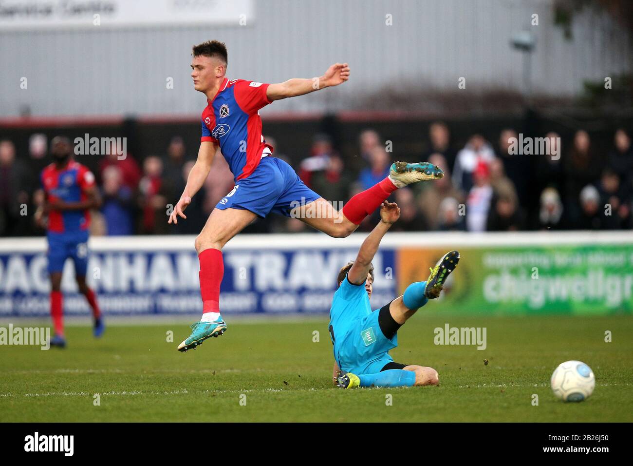 Harry Phipps of Dagenham and Craig Robson of Barnet during Dagenham ...