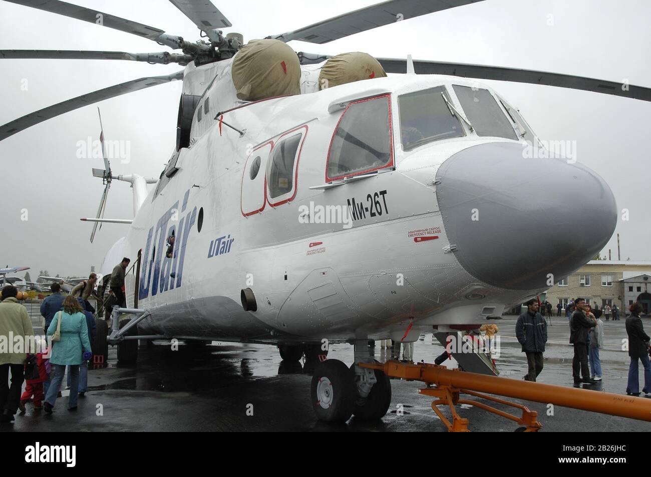 People explore the MI-26T helicopter Stock Photo - Alamy