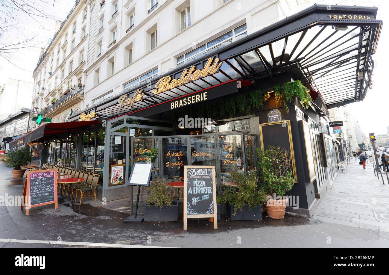 View of typical parisian cafe Botteli located at boulevard Saint Martin ...