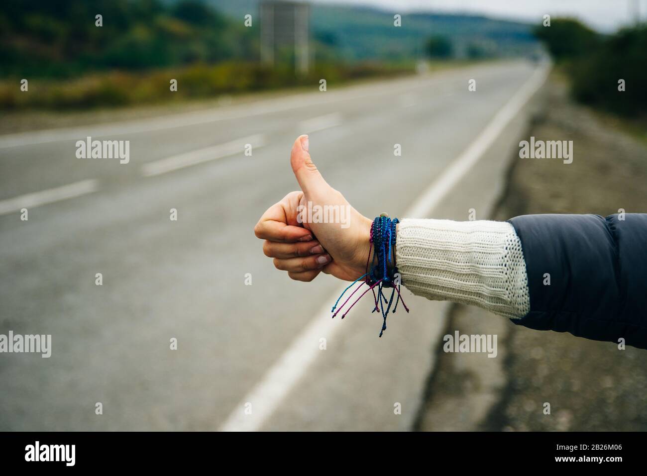 Hitch hiker sign hi-res stock photography and images - Alamy