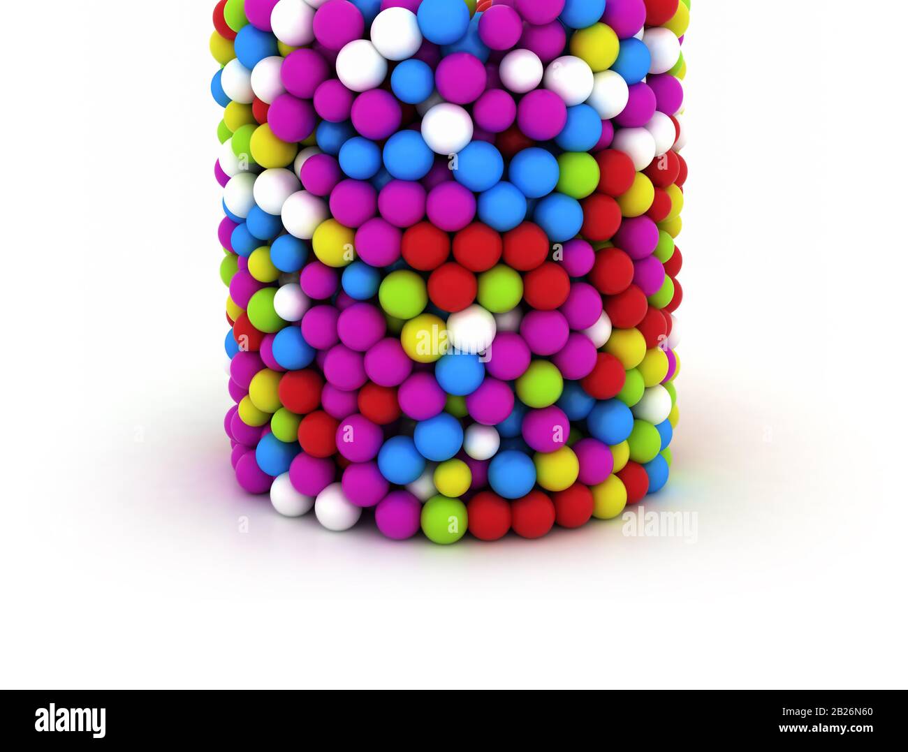 Mixed multi colour balls stacked on white background Stock Photo - Alamy