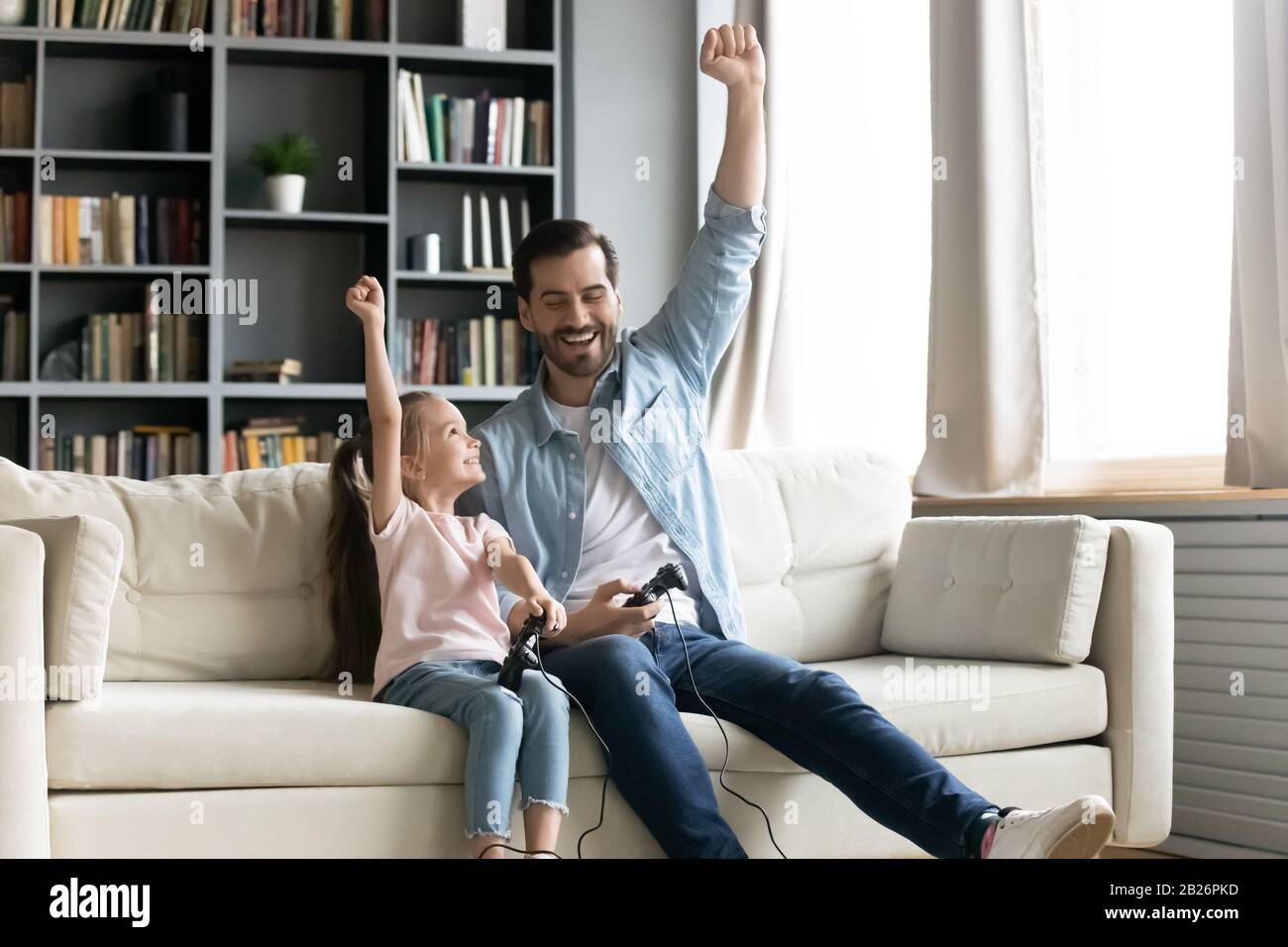 Daughter console hi-res stock photography and images - Alamy