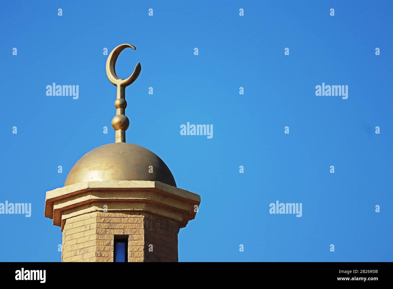 Brass or gold coloured muslim crescent symbol on gold dome hi-res stock ...