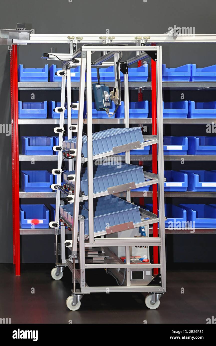 Sorting bins and cart in mail order distribution warehouse Stock Photo ...