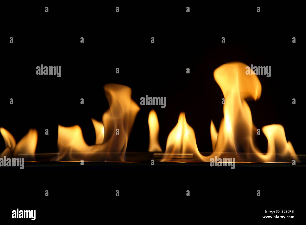 Oil burning fire with flames Stock Photo - Alamy