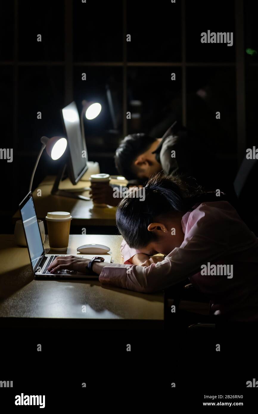 Asian man sleeping at desk hi-res stock photography and images - Alamy