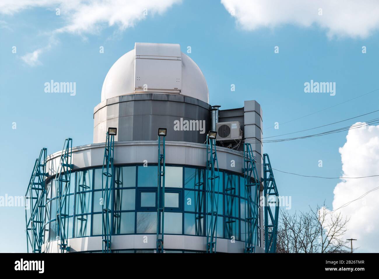 small observatory and planetarium over a blue cloudy sky Stock Photo ...