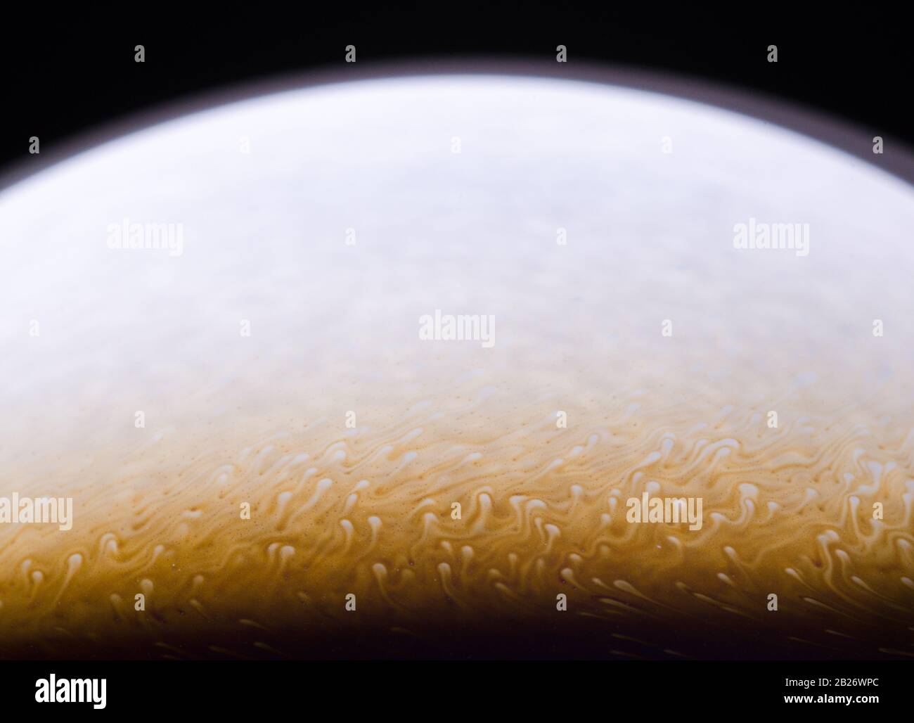 Macro of colorful iridescent soap bubble with abstract patterns and ...