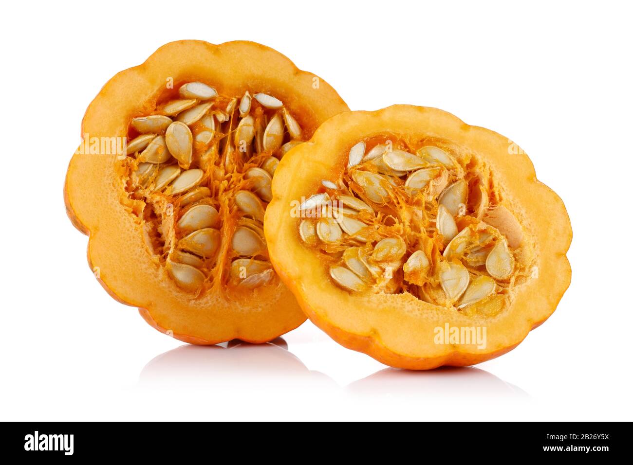 Half mini pumpkin with seeds isolated on white background Stock Photo ...