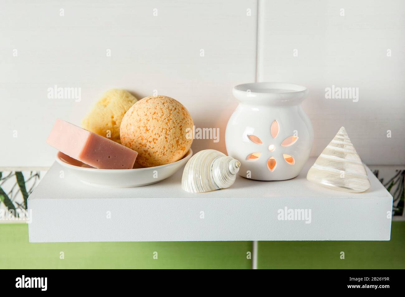 Bathroom products on simple minimal floating shelf indoors in bathroom ...