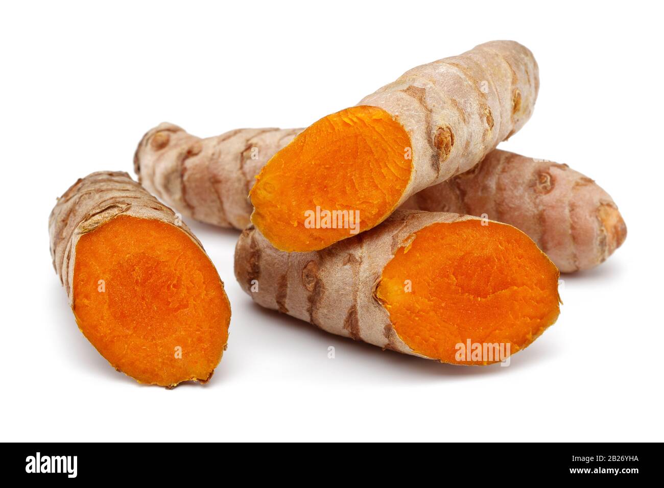 Fresh turmeric with slices isolated on white background Stock Photo - Alamy