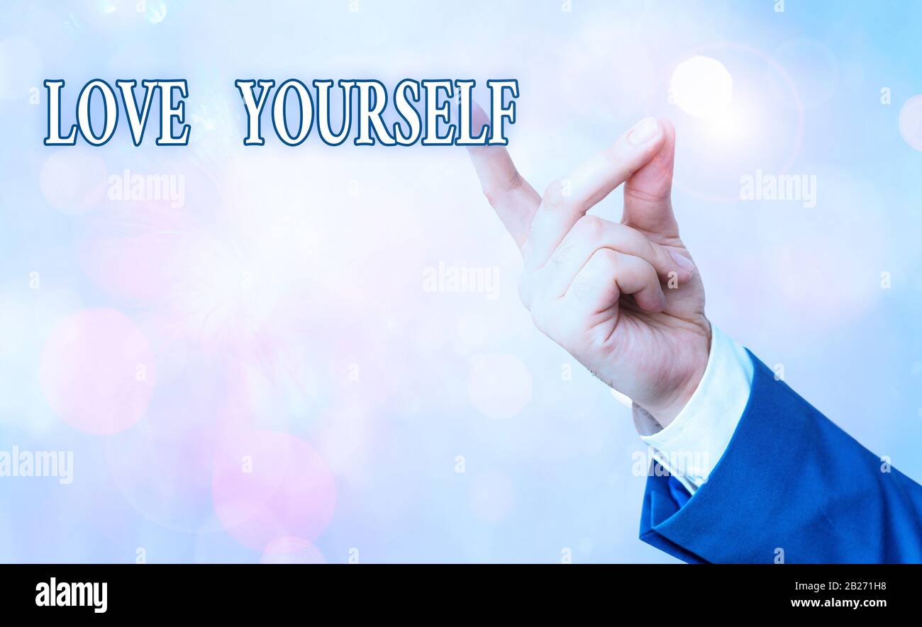 Writing note showing Love Yourself. Business concept for have ...