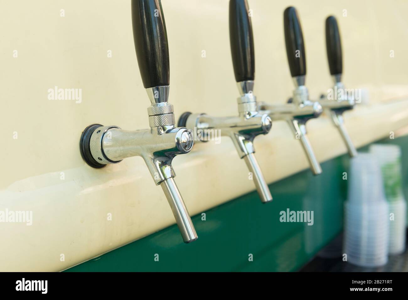 The beer taps in a side of a vintage van. nobody. Selective focus ...