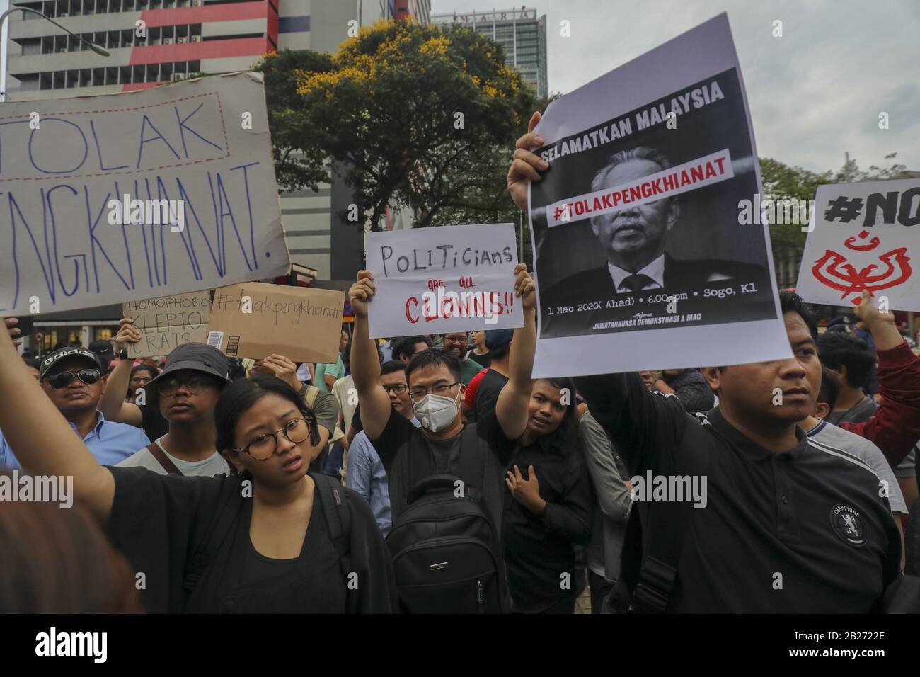 Kuala Lumpur, Malaysia. 1st Mar, 2020. Protester hold a placard during ...