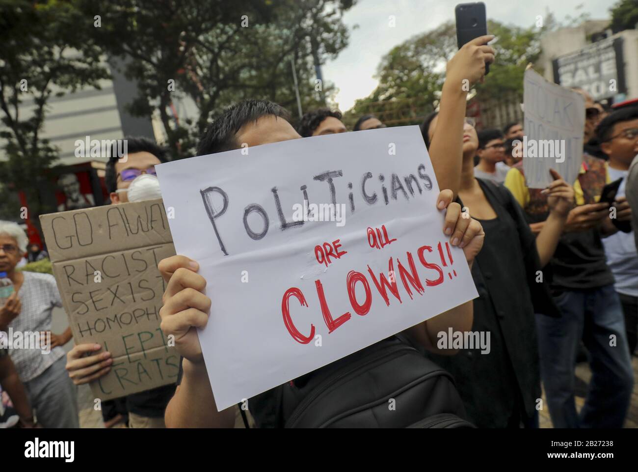 Kuala Lumpur, Malaysia. 1st Mar, 2020. Protester hold a placard during ...
