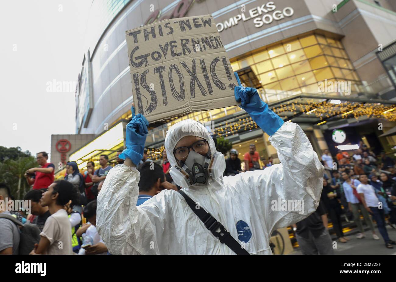Kuala Lumpur, Malaysia. 1st Mar, 2020. A protester hold a placard ...