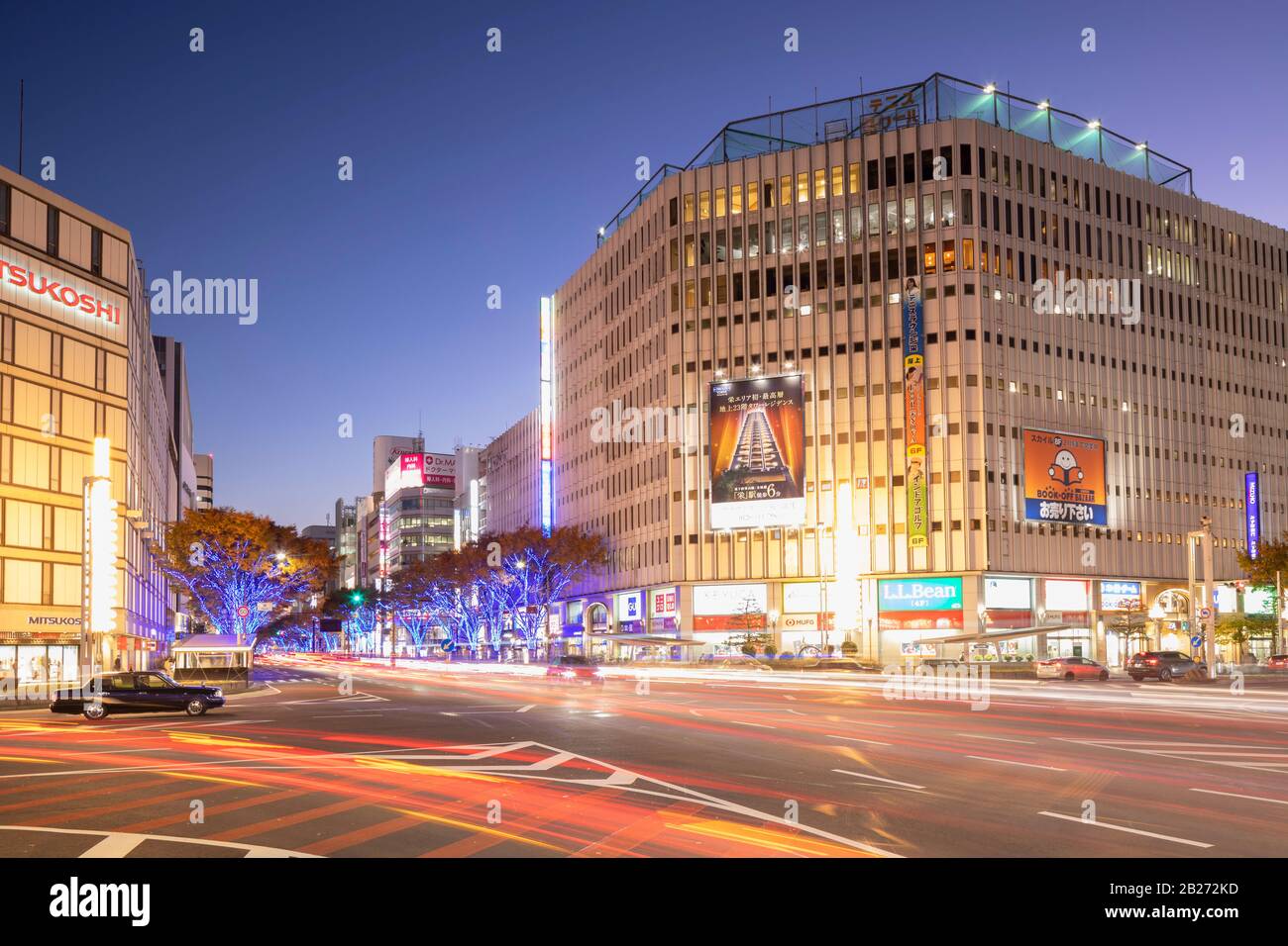 Traffic passing along shopping street at dusk, Nagoya, Japan Stock ...