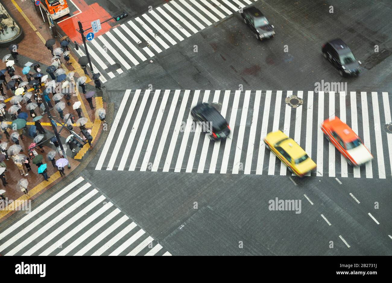 Cars passing through Shibuya Crossing, Shibuya, Tokyo, Japan Stock ...