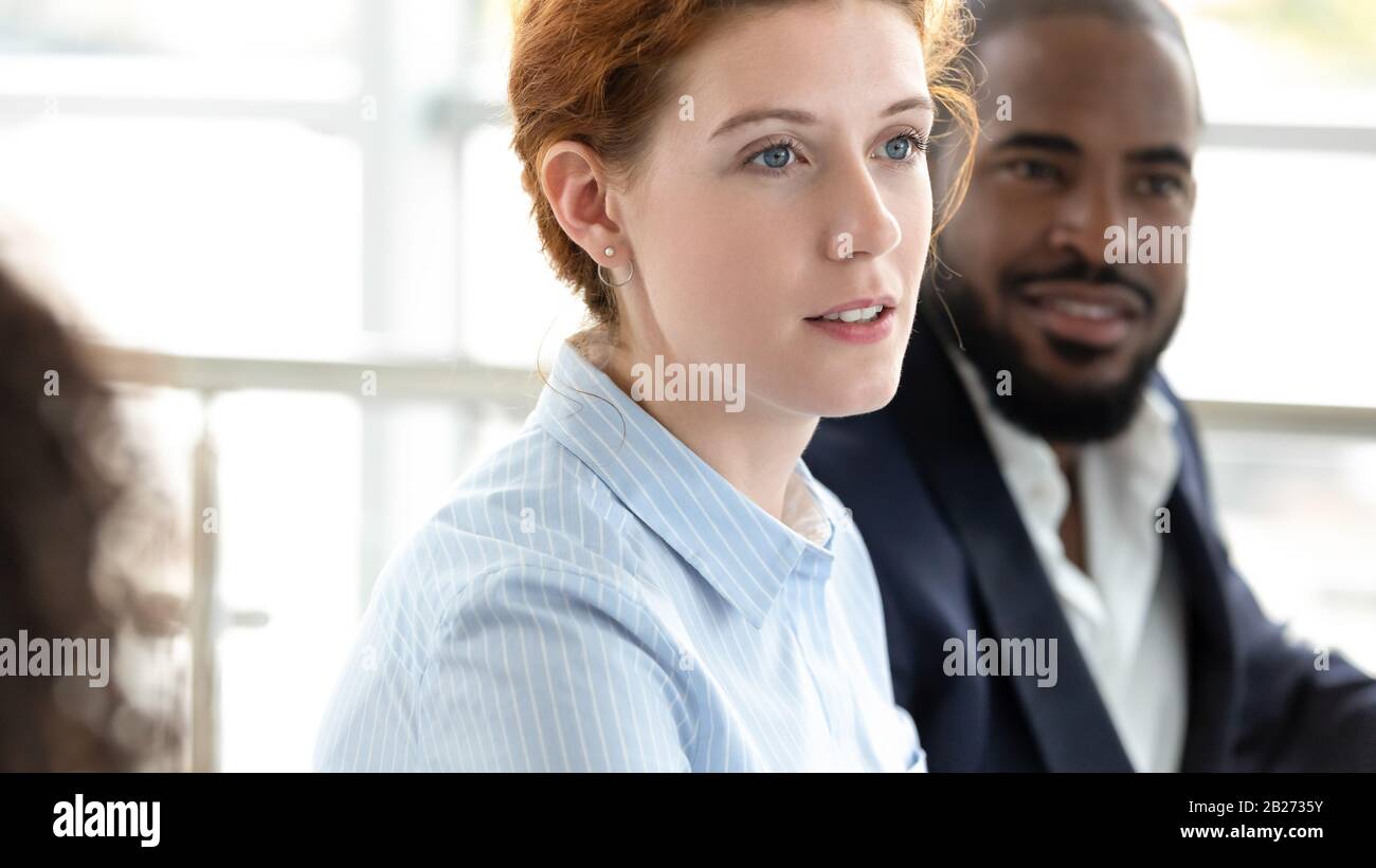 Attentive businesswoman listening worker hi-res stock photography and ...