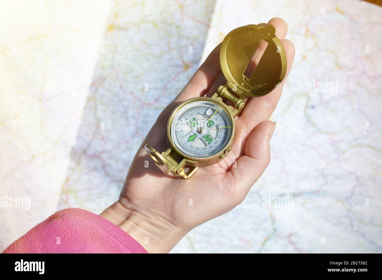 Compass in the hand Stock Photo - Alamy