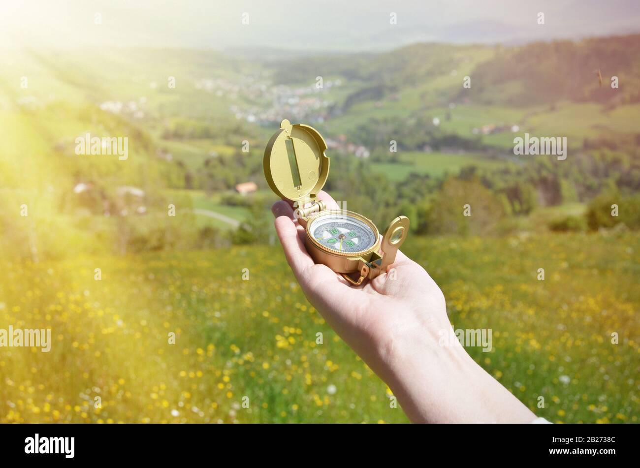 Compass in the hand Stock Photo - Alamy