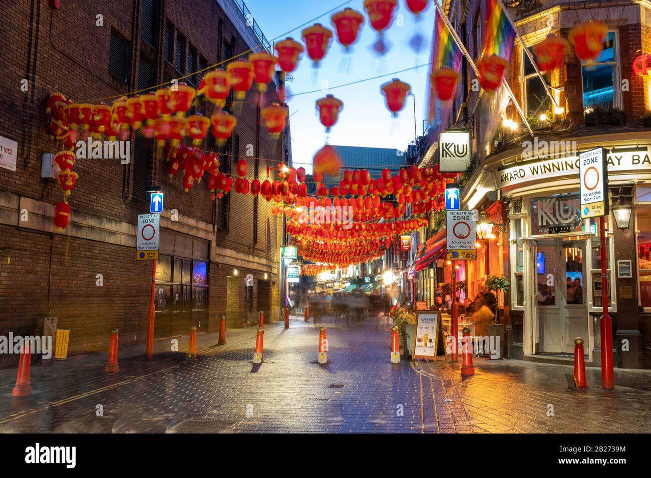 Lisle Street and Newport Street at night in London China Town, UK Stock ...