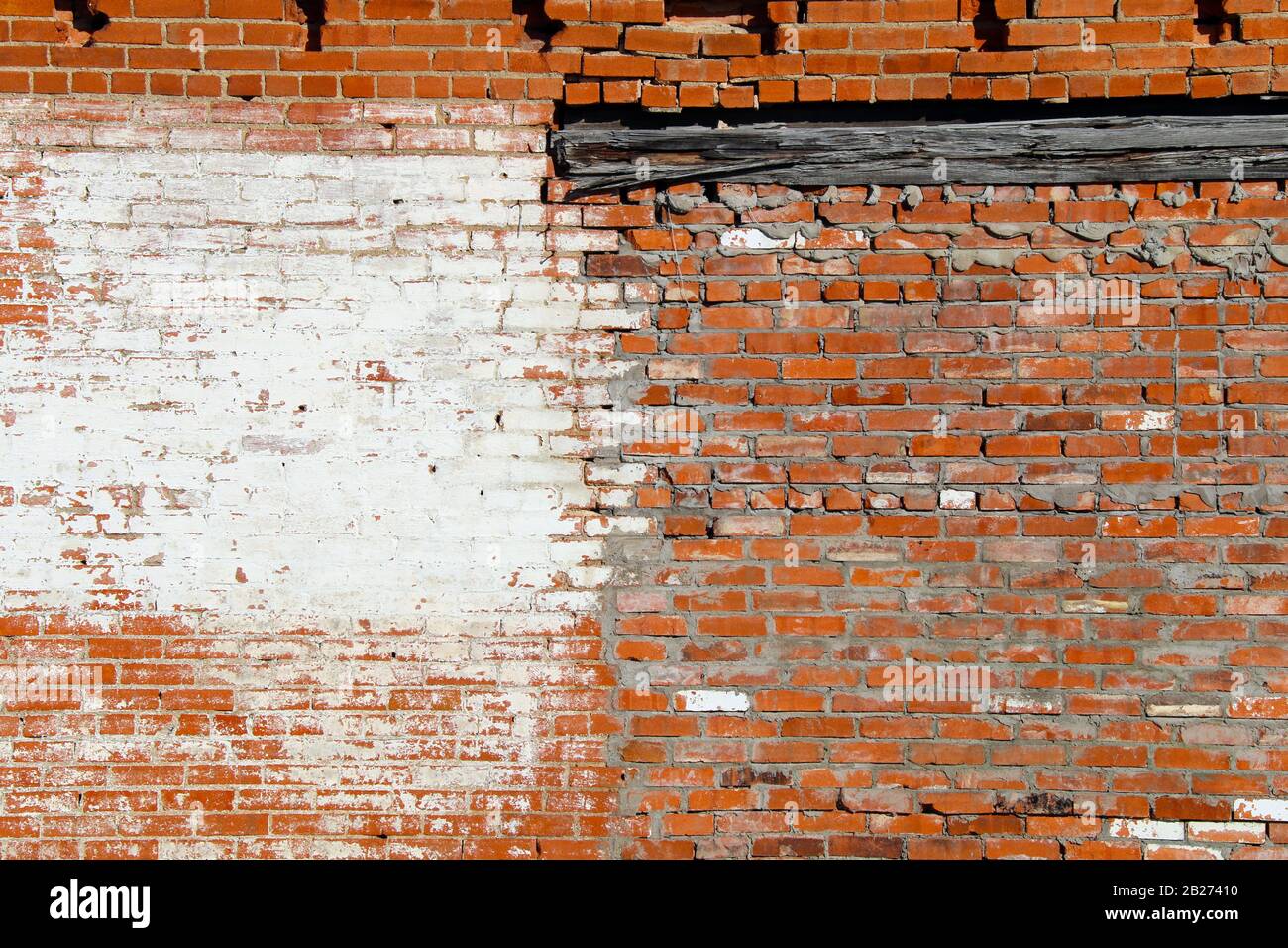an old abandoned exterior whitewashed red brick garden building wall ...