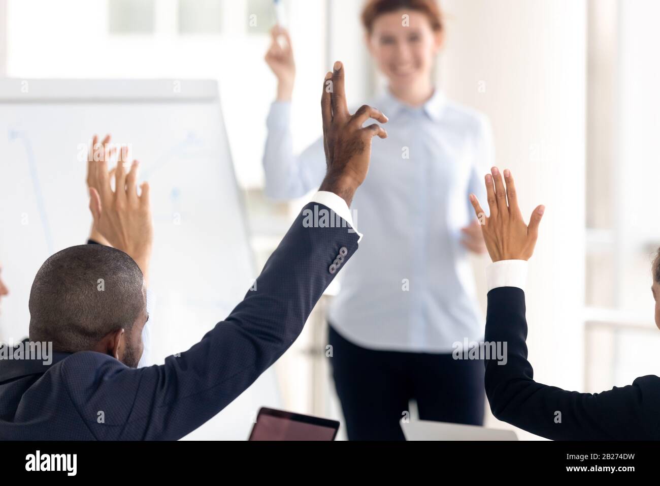 Employee raise hand ask hi-res stock photography and images - Alamy