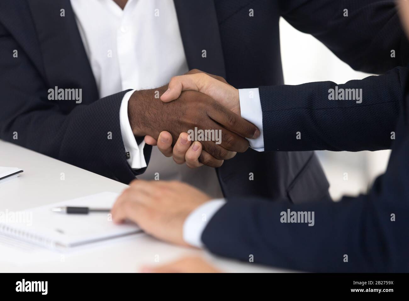 Close up of male handshake after effective negotiation Stock Photo - Alamy