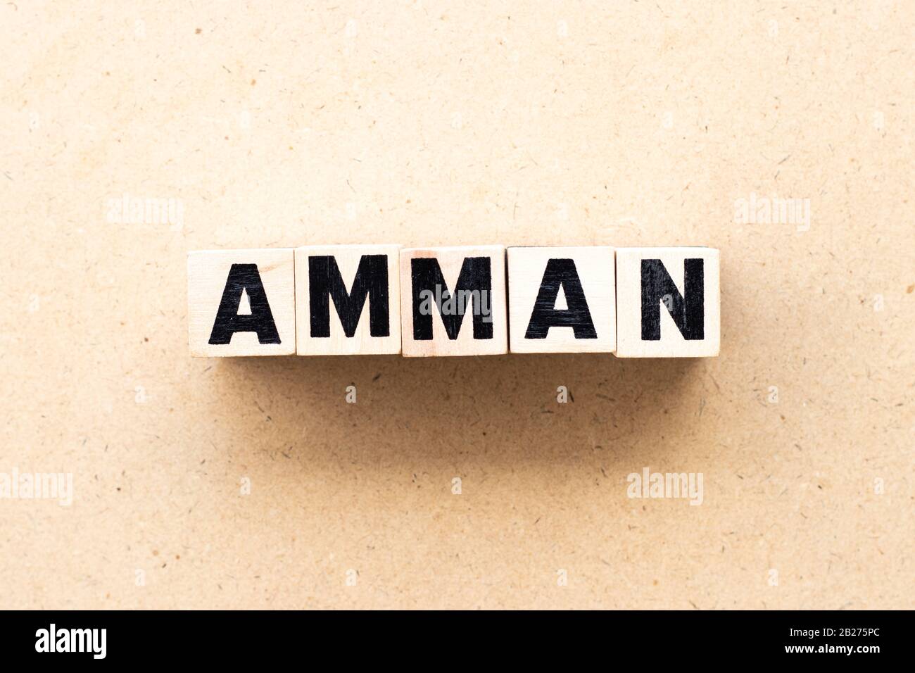 Letter block in word Amman on wood background Stock Photo - Alamy