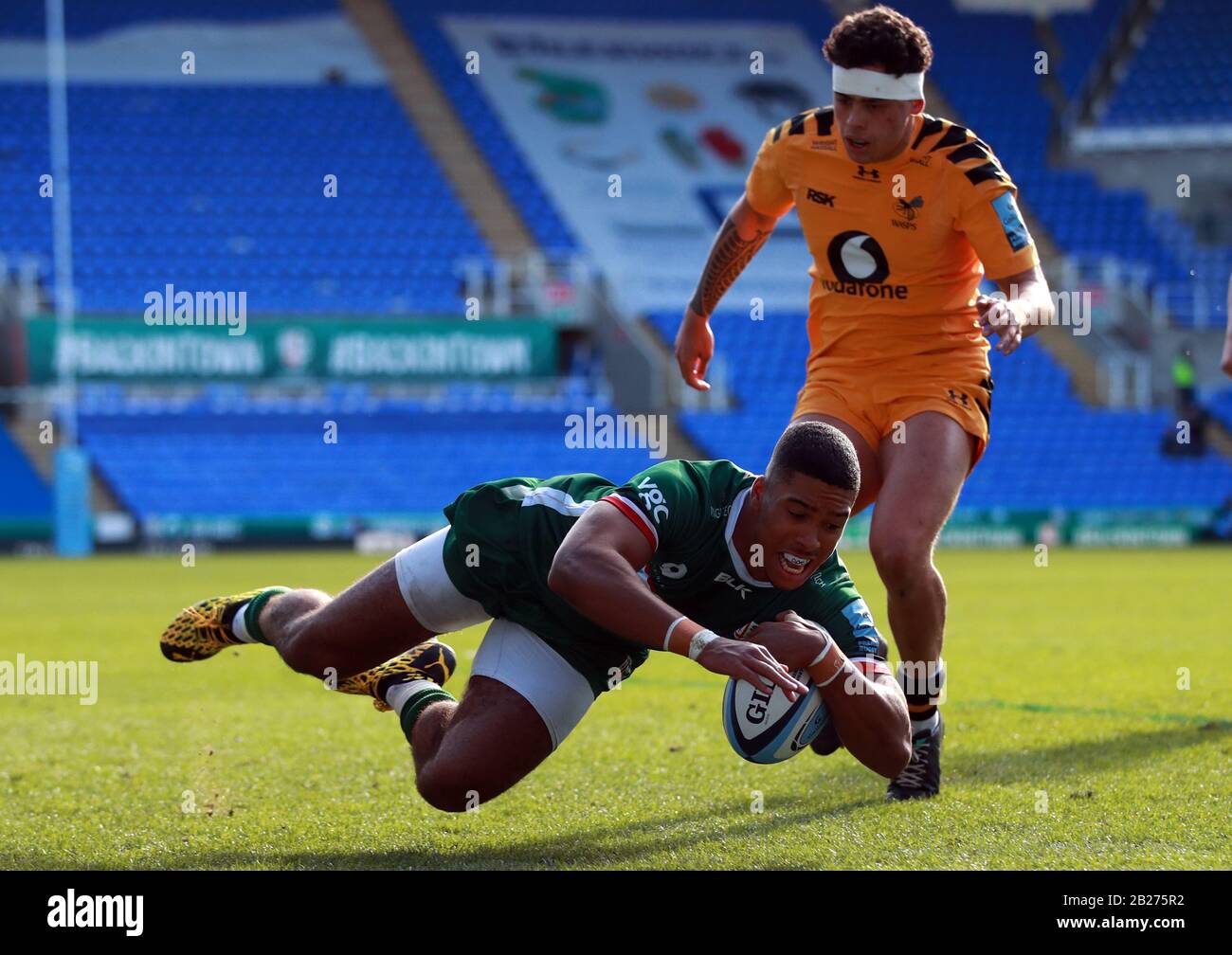 London Irish's Ben Loader goes over for their second try during the ...