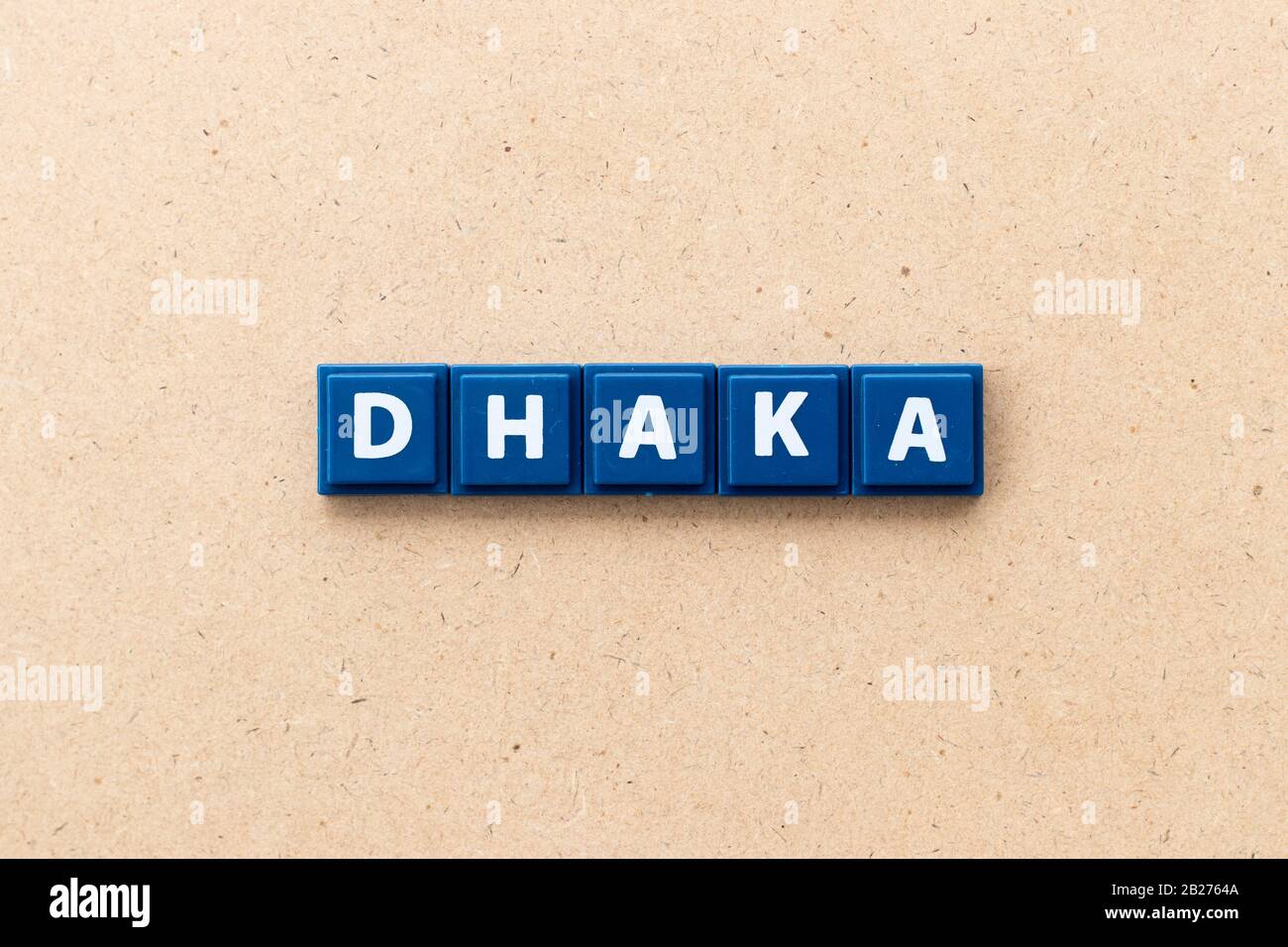 Tile letter in word Dhaka on wood background Stock Photo - Alamy