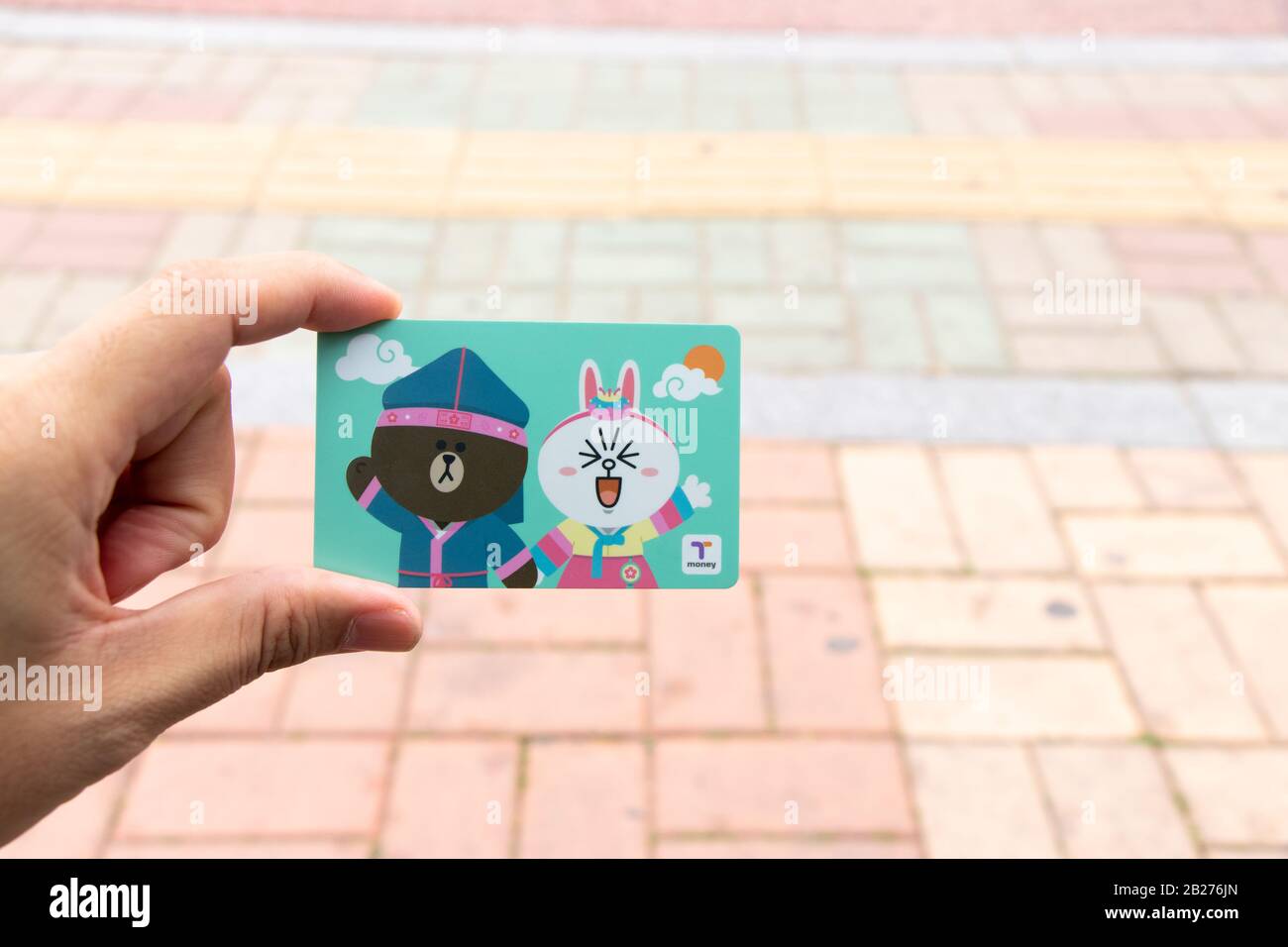 Seoul, South Korea- Oct 23, 2019 : Traveller hand hold t money card ...