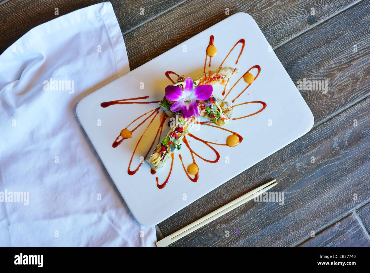 Ocean fried shrimp tempura roll sushi on a plate at a Japanese ...