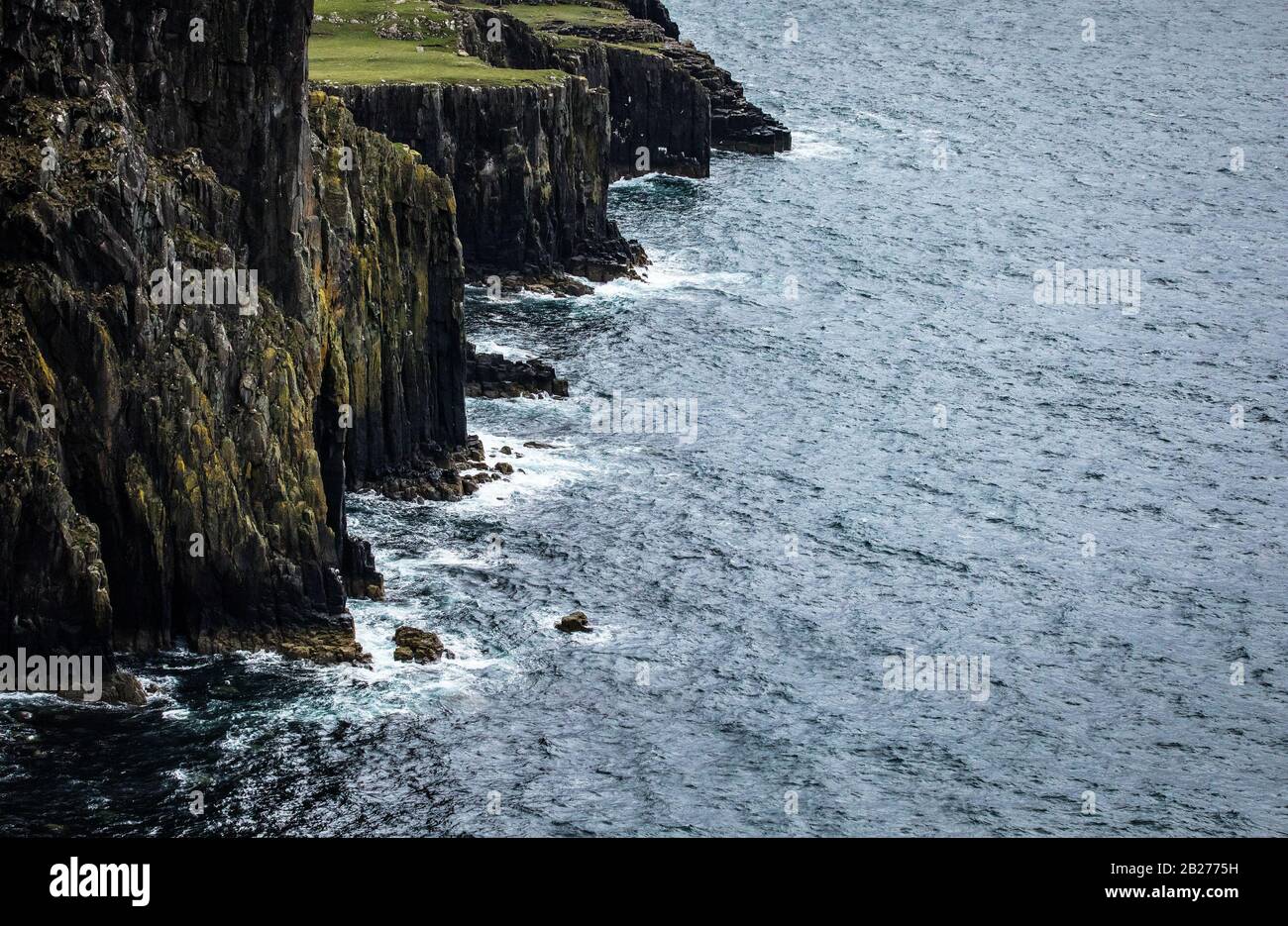 Waves breaking on coastal cliffs of Scotland Stock Photo - Alamy