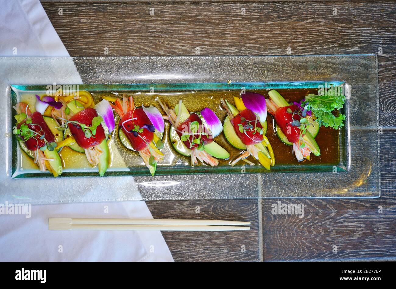 A plate of blue mango tuna sushi roll at a Japanese restaurant Stock ...