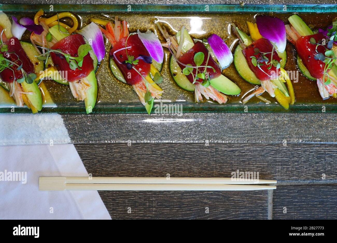 A plate of blue mango tuna sushi roll at a Japanese restaurant Stock ...