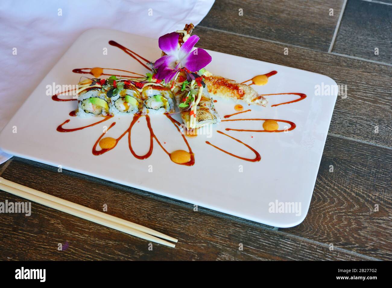 Ocean fried shrimp tempura roll sushi on a plate at a Japanese ...