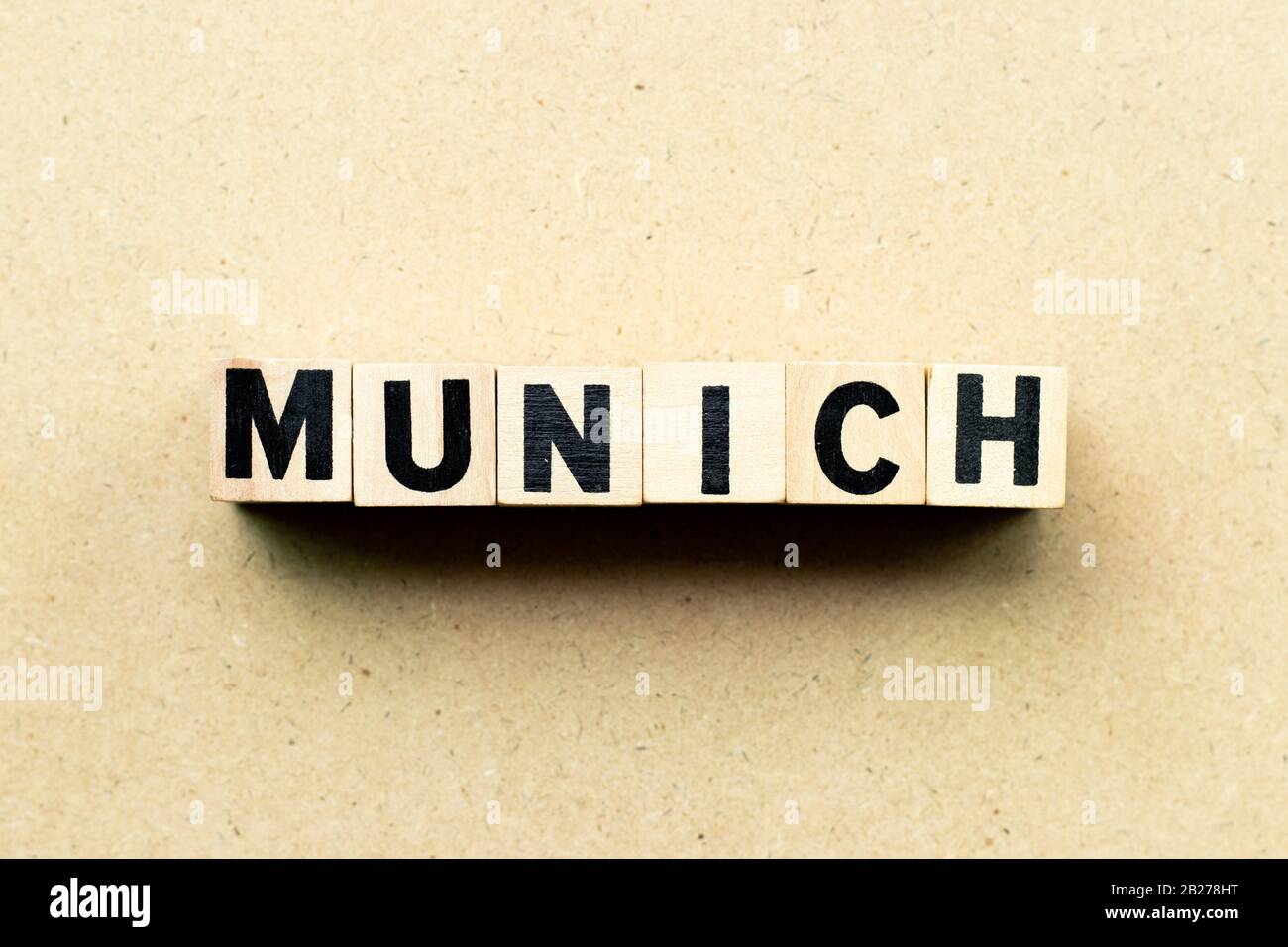 Letter block in word Munich on wood background Stock Photo - Alamy