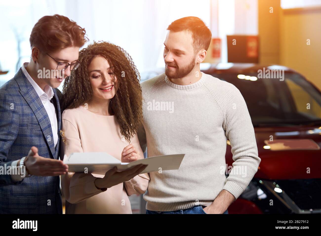 dealer in glasses offer a new luxury model for customers, close up ...