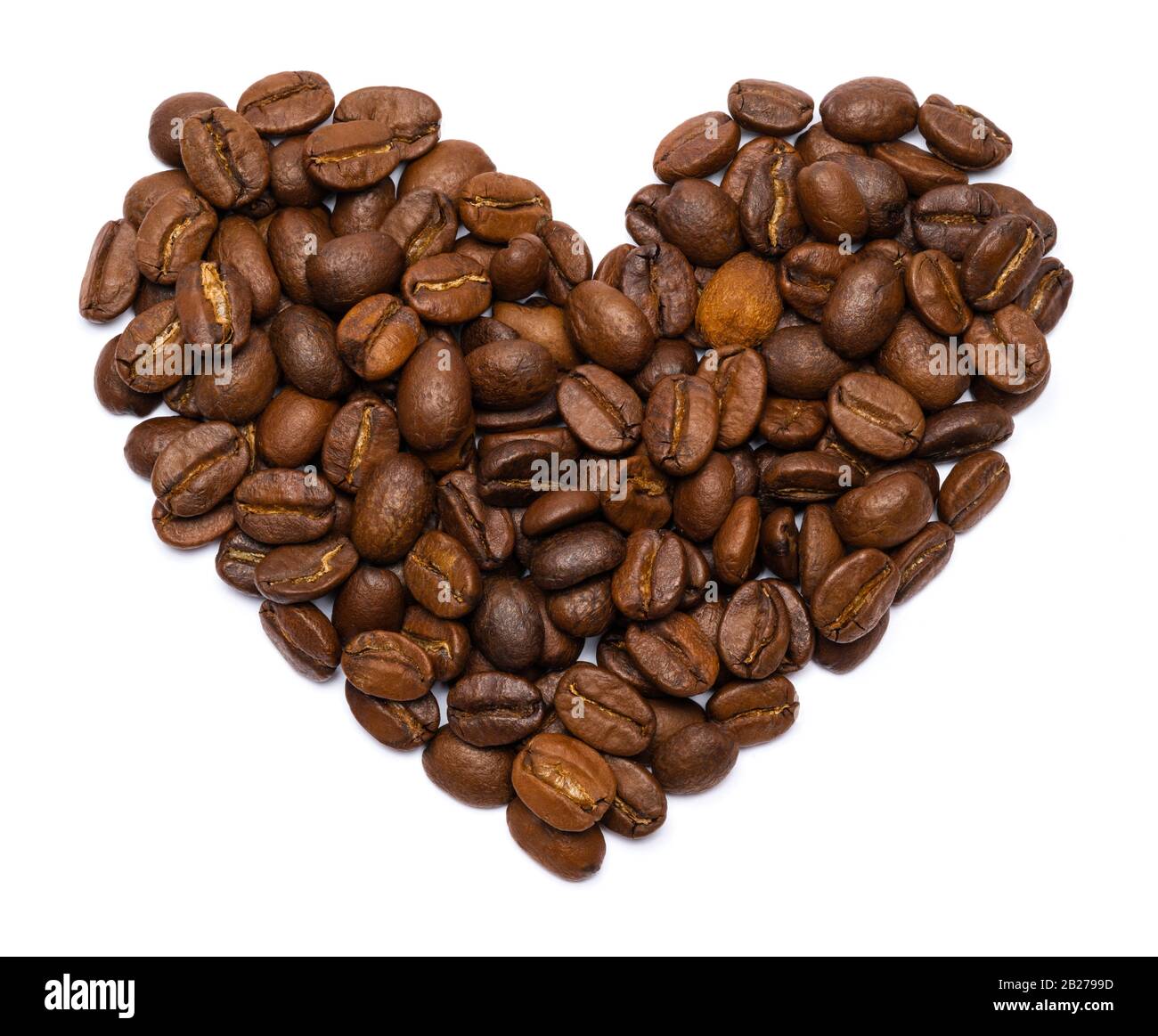 Roasted coffee beans in the shape of the heart isolated on white ...