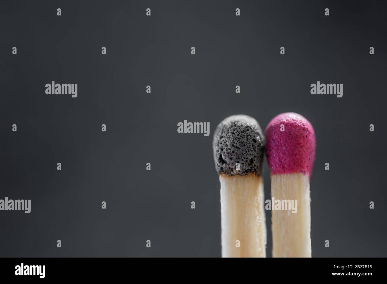 A burnt matchstick close to a fresh unused matchstick Stock Photo - Alamy