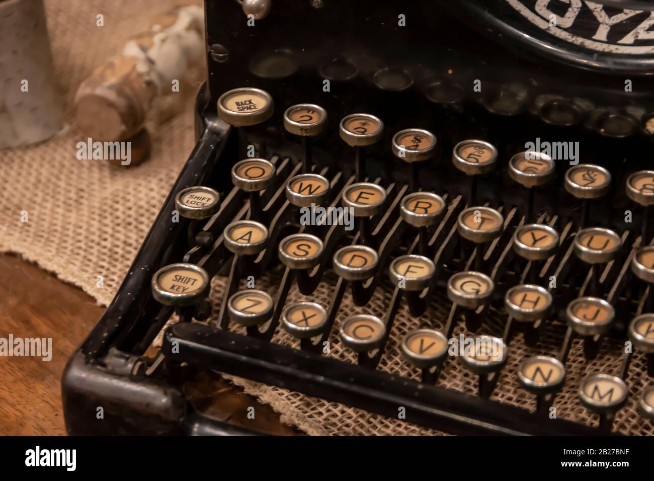 Round type keys of an antique metal typewriter Stock Photo - Alamy