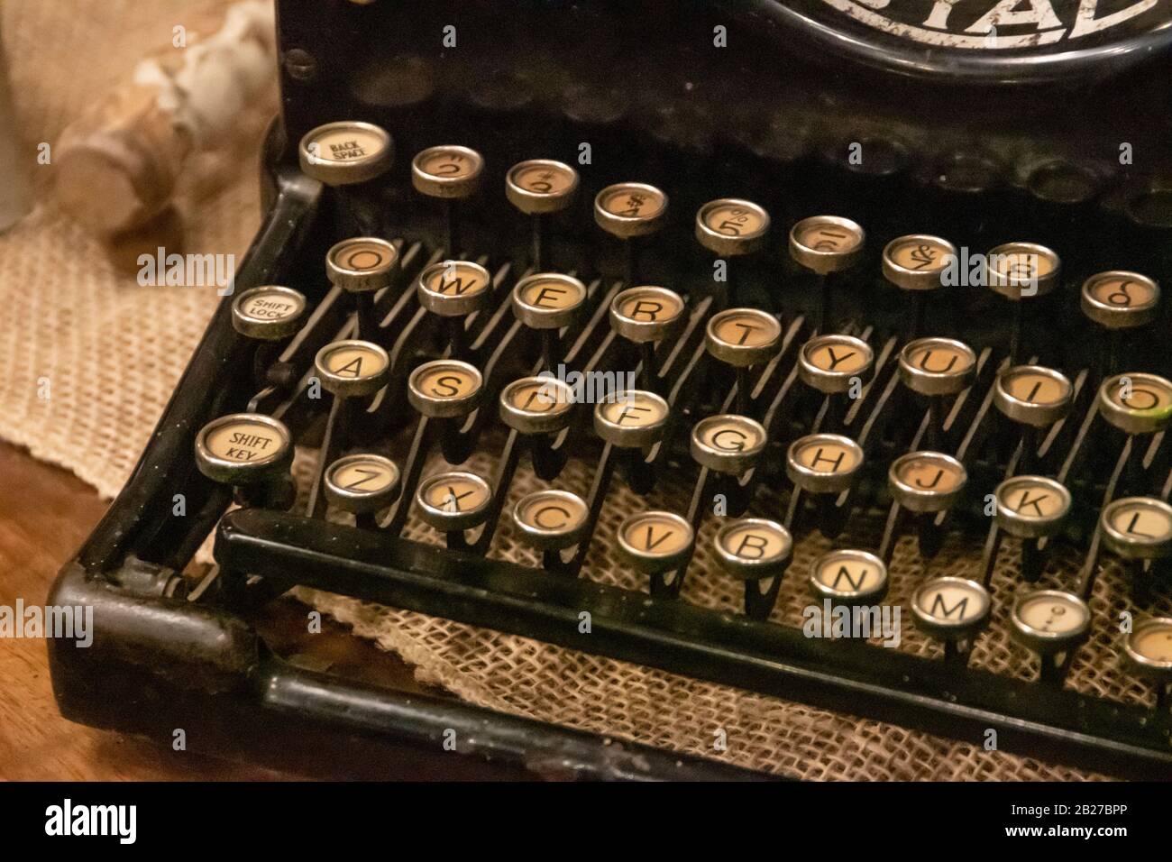 Round type keys of an antique metal typewriter Stock Photo - Alamy