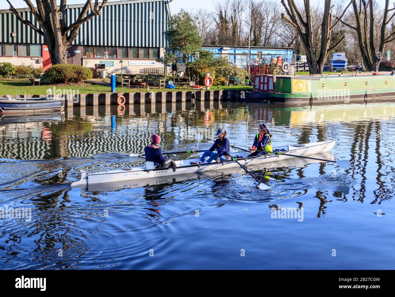 Female coxed pairs rowing past spring Lea Cruising Club on the River ...